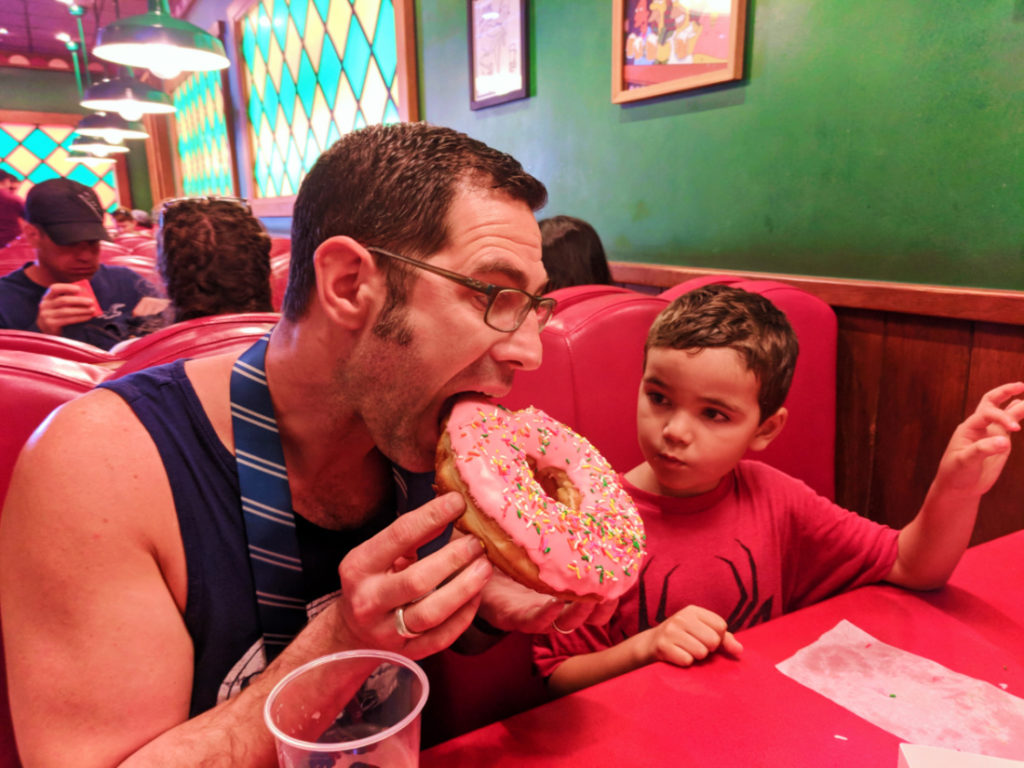 Taylor Family eating Big Pink Donut in Simpsons area Universal Studios ...